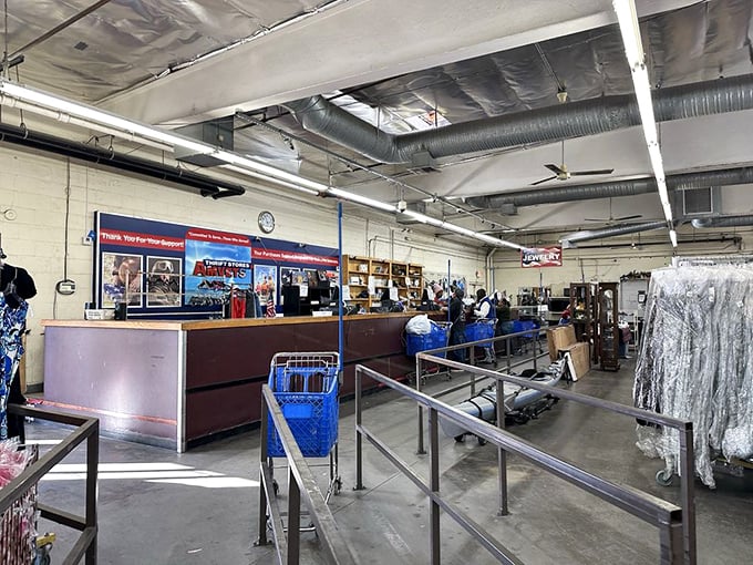 The checkout counter – final gateway between intention and acquisition. Those blue carts have witnessed countless "I can't believe I found this!" moments.