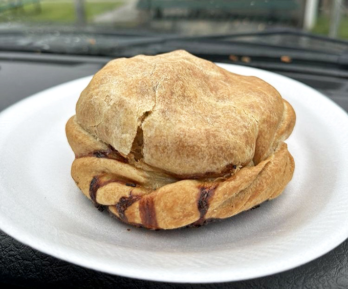 The chicken pasty offers a lighter alternative to beef, though "lighter" is relative in the world of hand-held meat pies. Still worth every delicious calorie.