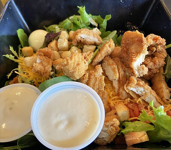 A crispy chicken salad that makes eating greens feel like cheating on your diet. Those dressing cups are practically winking at you.