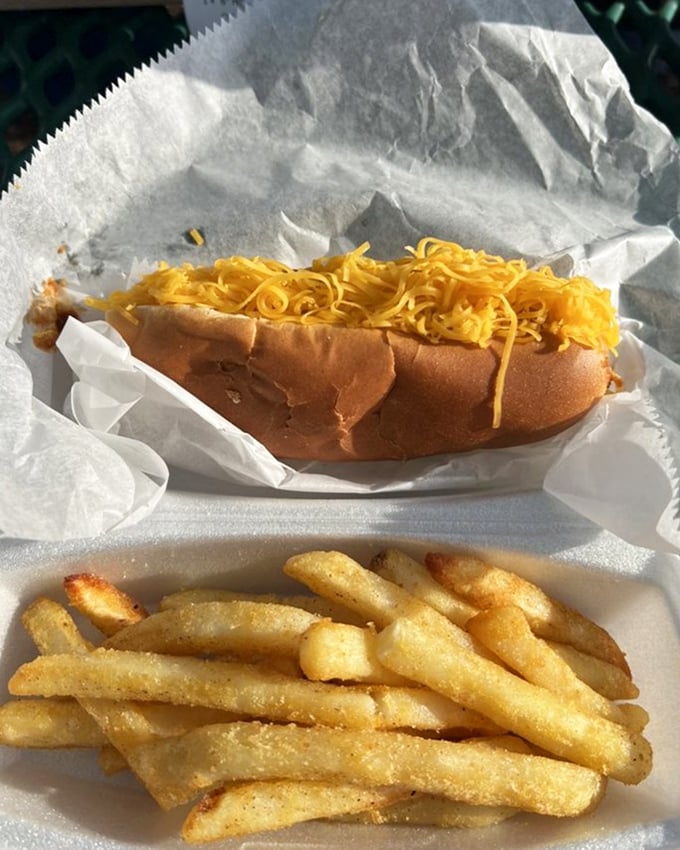 Cincinnati-style coney dogs don't need fancy toppings—just a blanket of that distinctive chili and a snowfall of finely shredded cheddar cheese.