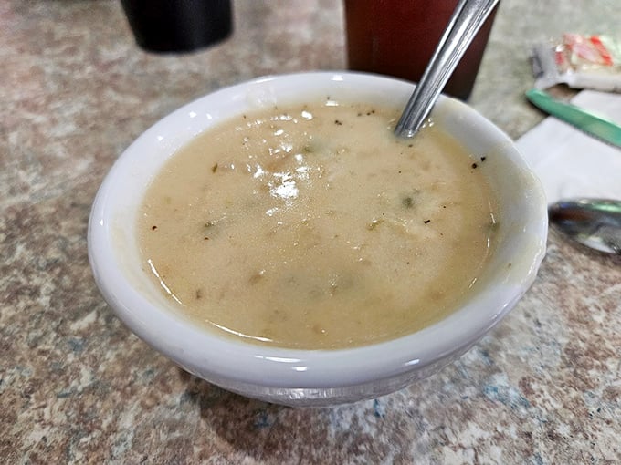 Clam chowder that doesn't mess around—creamy, substantial, and demanding respect as a meal in itself rather than a mere prelude.
