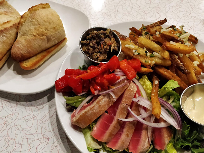 Seared tuna, perfectly pink, surrounded by colorful companions—a plate that makes you wonder why you'd ever eat any other way.