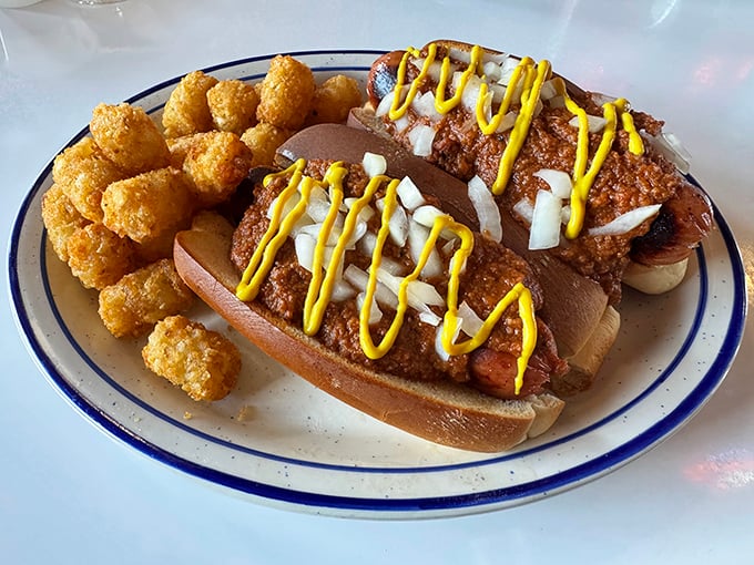 This isn't just a hot dog – it's a Coney with attitude, dressed to impress and chaperoned by golden tater tots.