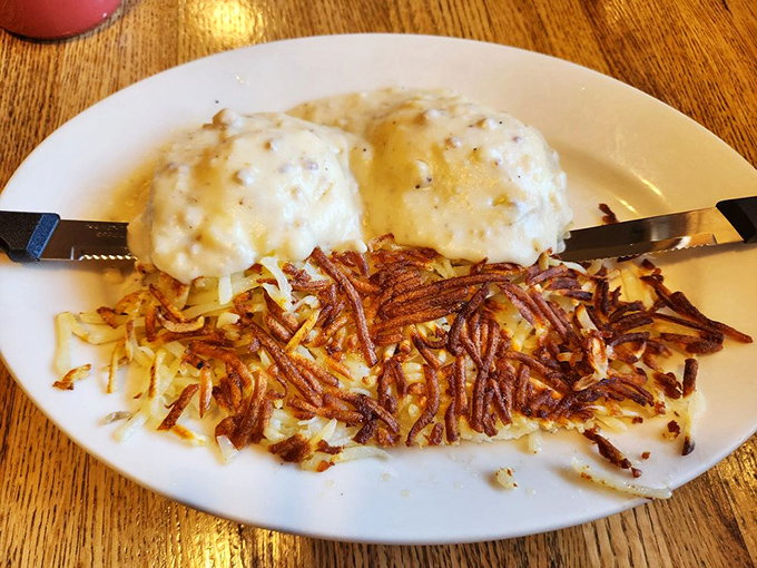 Country Benedict—where biscuits replace English muffins in America's greatest breakfast revolution since someone decided bacon and eggs belonged together.