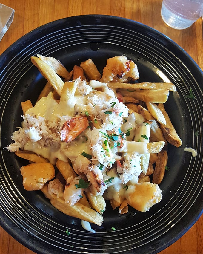 Crab poutine fries—because sometimes the most beautiful relationships are the ones nobody saw coming. Canada, meet California. You're welcome.