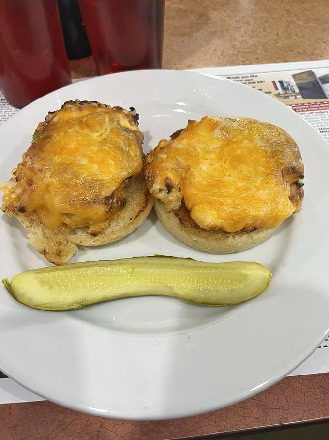 These English muffins have found their true calling as vessels for melted cheese and crabmeat—the pickle stands guard against mundane flavors.