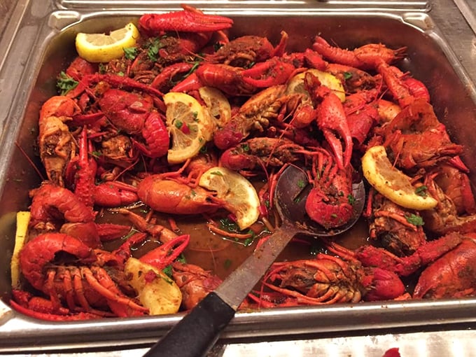 Crawfish bathed in lemon and spices—like tiny lobsters that threw the party of the year and invited you to dive in.