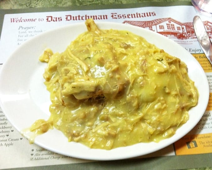 Chicken and biscuits swimming in golden gravy—the kind of dish that makes you understand why people write country songs about going home.