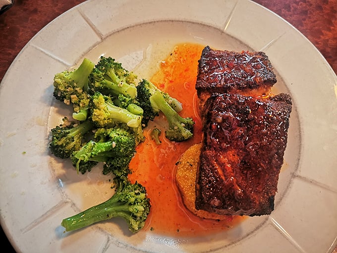 This salmon isn't just cooked; it's transformed – glazed to perfection and paired with vibrant broccoli for guilt-free indulgence.