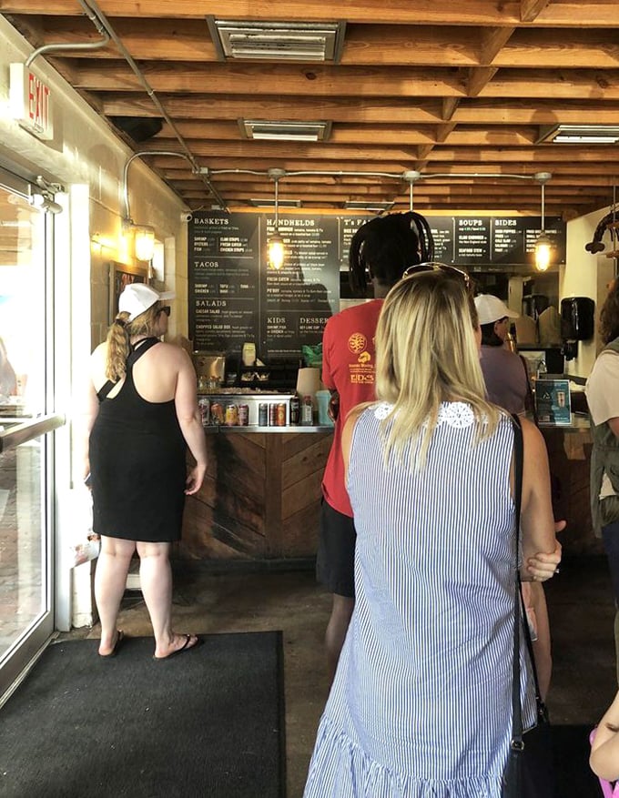 The ordering line at Timoti's – where strangers become comrades united by the common purpose of securing exceptional seafood. The anticipation is palpable.