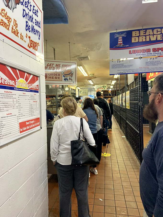 The ordering line at The Beacon is a masterclass in patience—a pilgrimage of the hungry faithful waiting for their turn at the counter.