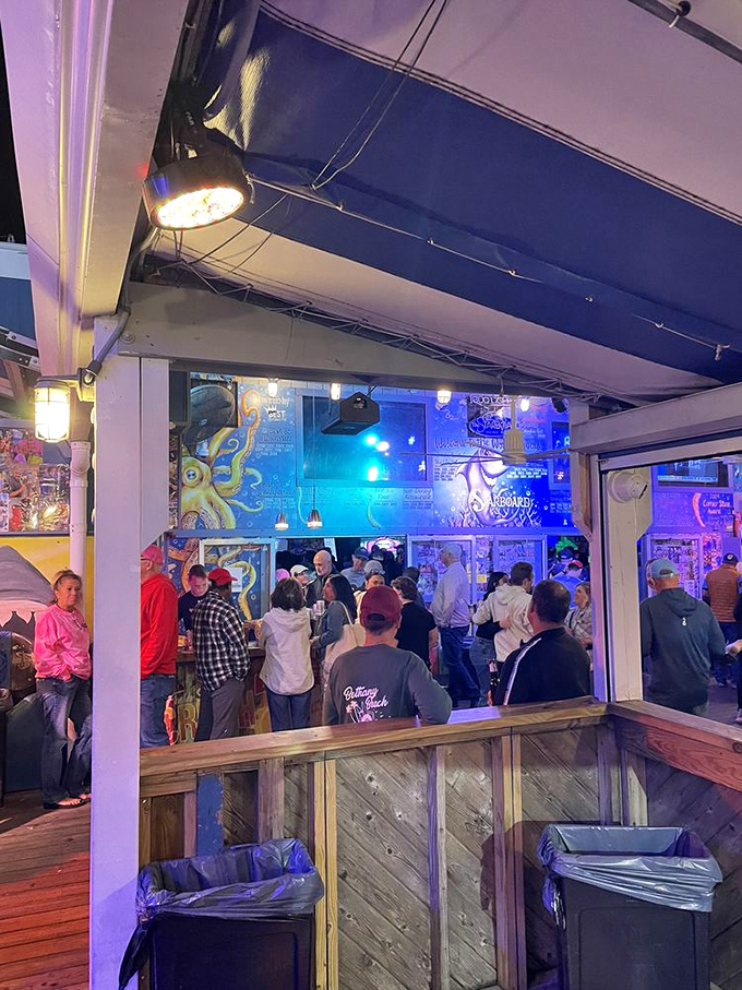 The evening crowd at The Starboard creates that perfect buzz—the human equivalent of a well-mixed cocktail where everyone becomes an ingredient in the night's success.