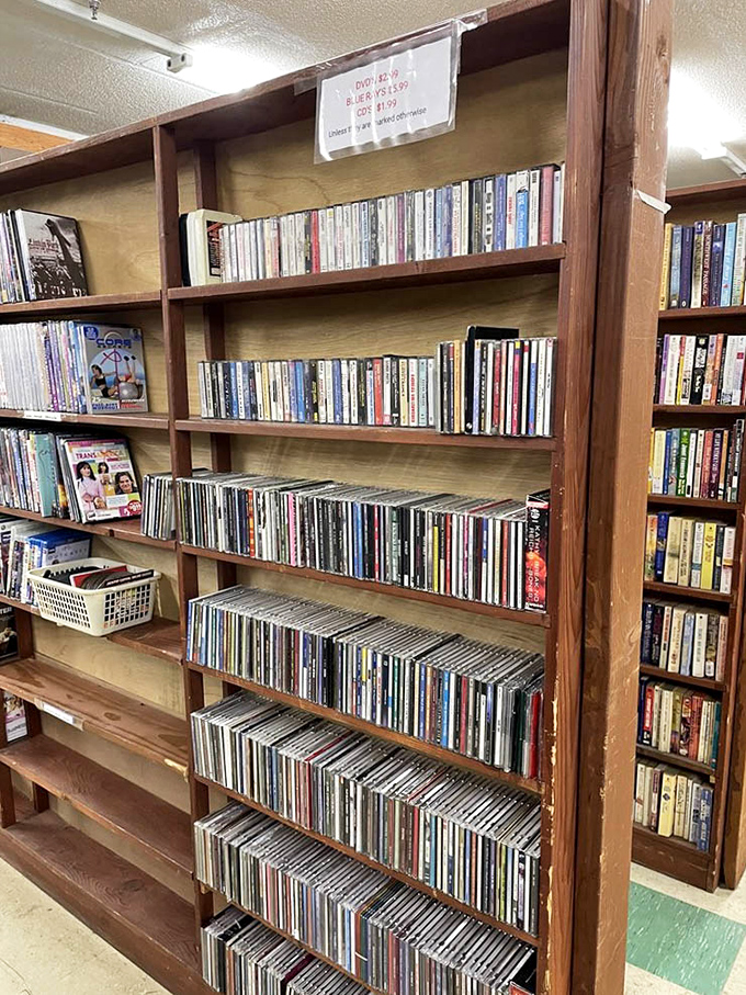 The media section offers a physical Netflix of DVDs and CDs—a reminder of when entertainment took up actual shelf space.