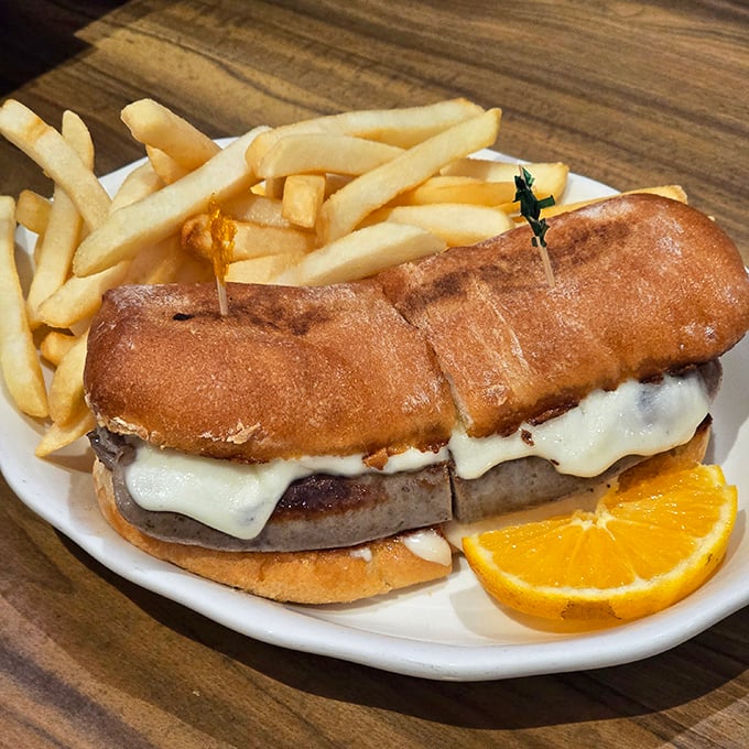 This Danish sausage sandwich isn't just lunch—it's a handheld masterpiece of melted cheese and savory goodness that makes drive-thru options seem like cruel jokes.