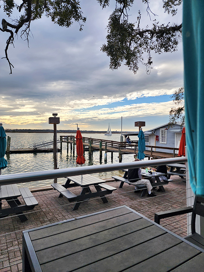 Sunset dining at its finest – where the sky performs its daily color show as sailboats glide by, perfectly timed to your dessert arrival.