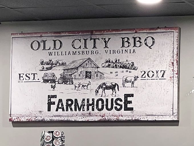 Farmhouse aesthetic meets barbecue reality – a sign that promises what your nose already told you: serious meat business happens here.