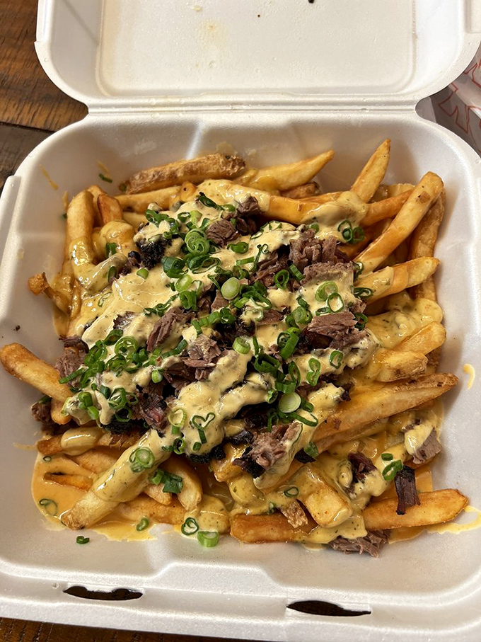 Dirty Frites that would make clean eating enthusiasts reconsider their life choices. These loaded fries are worth every napkin you'll need. 