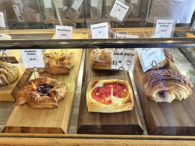 A pastry case that's basically speed dating for your taste buds – so many tempting choices!