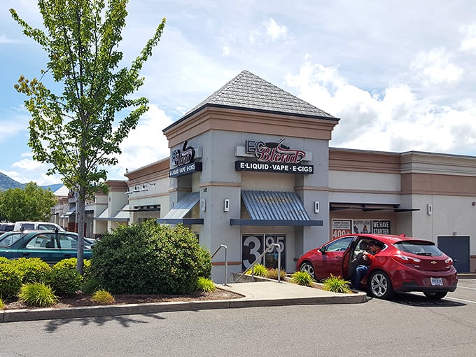 Every town needs its practical side—vape shops and convenience stores keep things real while the mountains keep things spectacular.