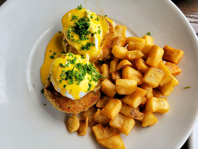 Benedict gets a coastal makeover with these crab cake creations. That hollandaise sauce isn't just yellow—it's liquid sunshine on a plate.