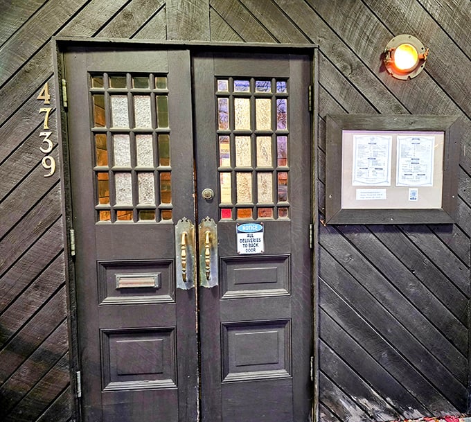 These doors have welcomed seafood lovers for generations – the nautical-themed entrance setting the stage for the maritime feast that awaits inside.