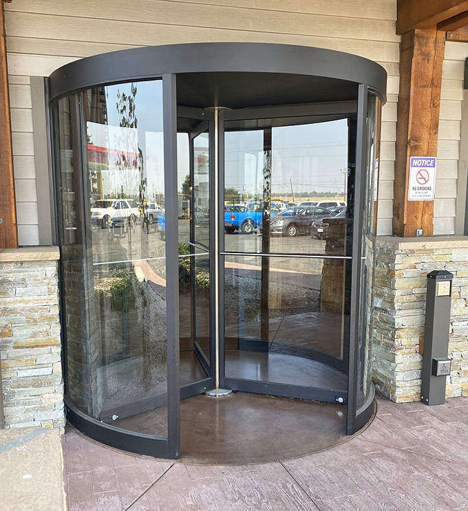 The revolving door entrance—spinning you from everyday life into a world where calories don't count and comfort reigns supreme.