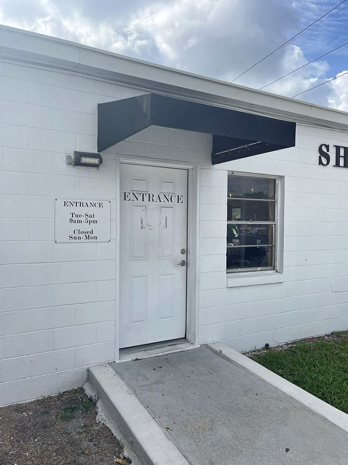 The entrance beckons with promises of air-conditioned treasure hunting—a welcome respite from Florida's famous sunshine.