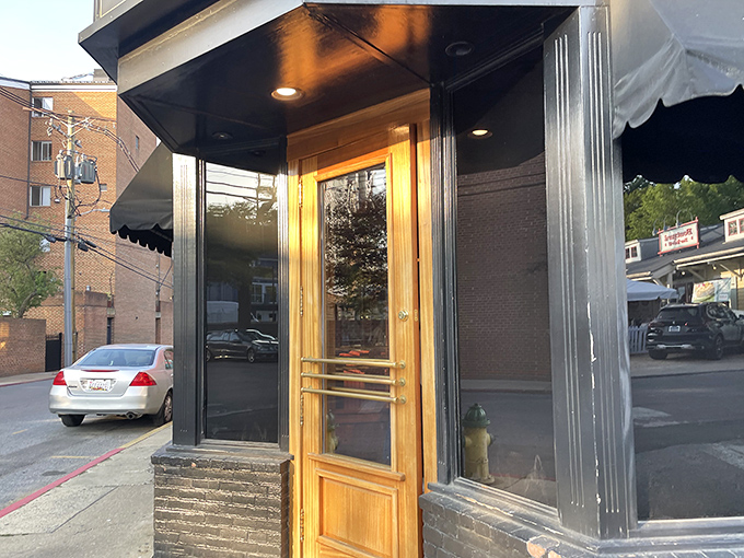 That wooden door isn't just an entrance – it's a portal between the everyday world and a realm where steak reigns supreme.