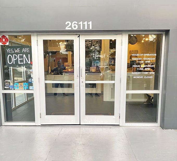 "YES, WE ARE OPEN"—four beautiful words that promise refuge from cooking at home, displayed on doors that have welcomed hungry Floridians for generations.