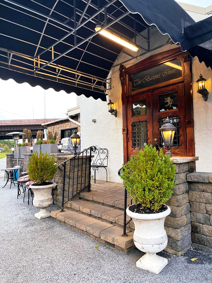 "The Baron's Inne" entrance beckons with old-world charm, like a portal to a time when dinner was an event, not just a meal.
