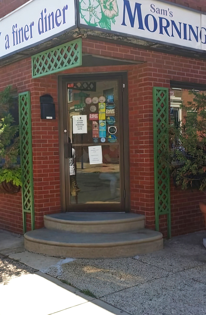 That green lattice entrance whispers "come on in" – Sam's Morning Glory knows how to make an invitation.