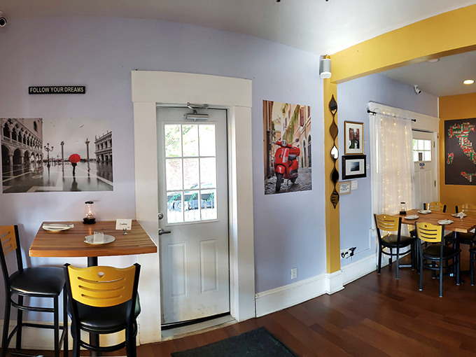 Italian wanderlust adorns the walls. Vintage photos of Venice and a cherry-red Vespa transport diners across the Atlantic between bites.