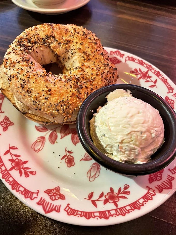 The everything bagel – where "everything" means exactly that. Paired with cream cheese that's been elevated from condiment to art form.