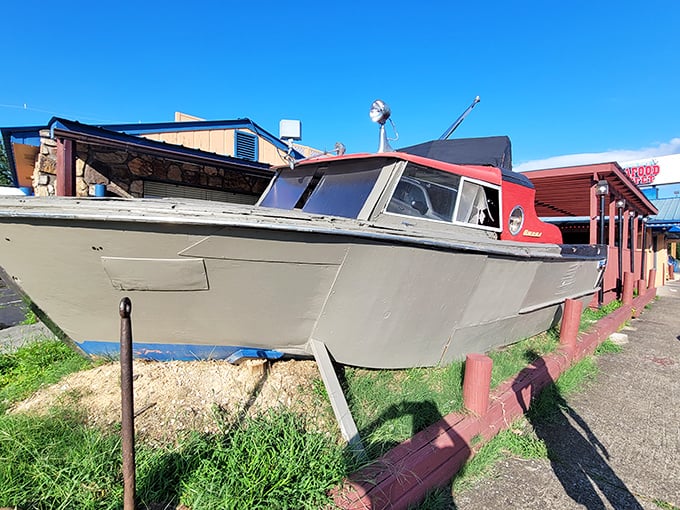 An actual boat guards the restaurant's perimeter – either as decor or as emergency transportation when the seafood supply runs low.