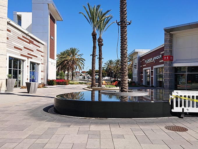 Tranquil water features and swaying palms create moments of zen between shopping conquests, reminding visitors they're still in California despite wallet fatigue.