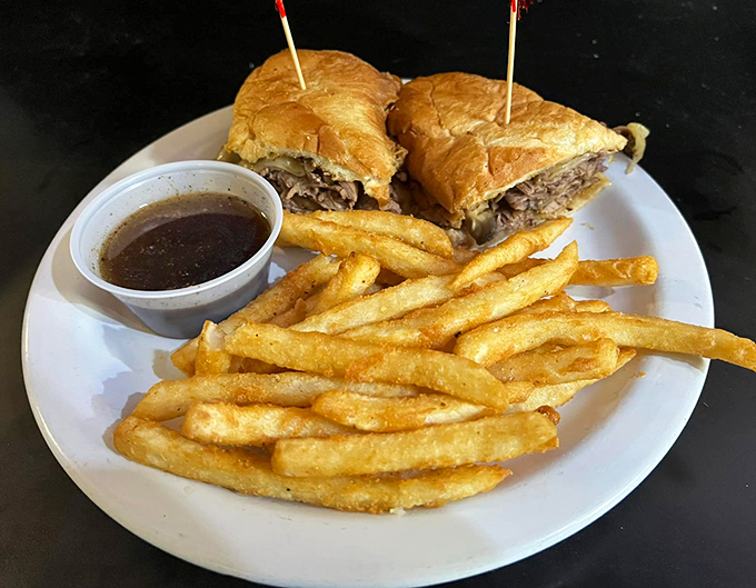 The French dip with au jus isn't just a sandwich—it's an interactive experience where each dunk brings a new dimension of beefy bliss.