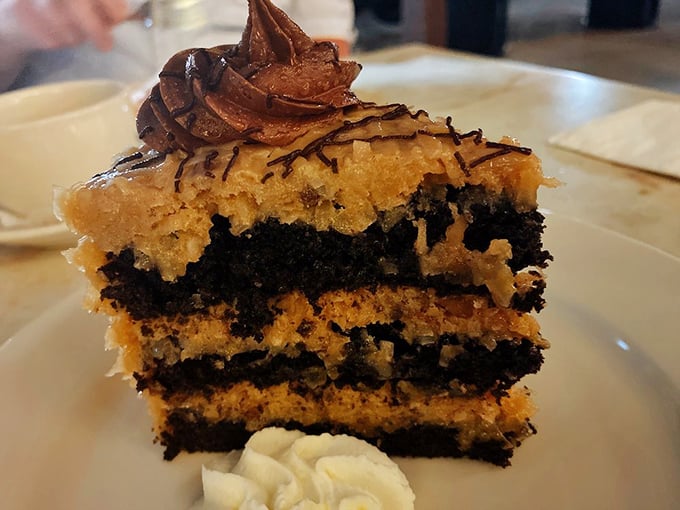 German chocolate cake that's layered with such care it could pass for edible architecture—each bite delivering chocolate, coconut, and pure happiness.
