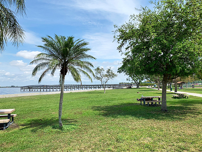 Gilchrist Park's waterfront picnic tables sit patiently waiting for sunset gatherings, where locals debate whether today's harbor view is merely gorgeous or absolutely spectacular.