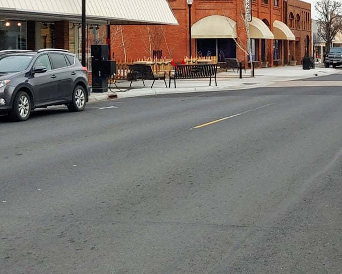 Downtown benches invite lingering conversations—the original social network that never needs a password update.