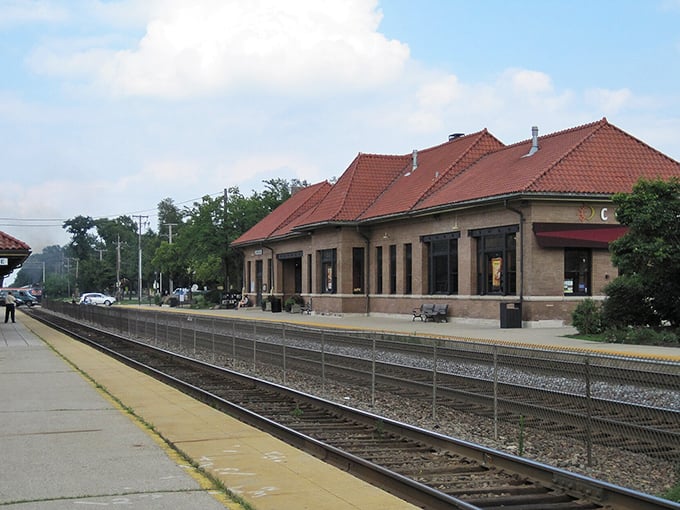 Hinsdale's historic train station doesn't just connect the village to Chicago—it's a terracotta time machine to when railway architecture had personality.