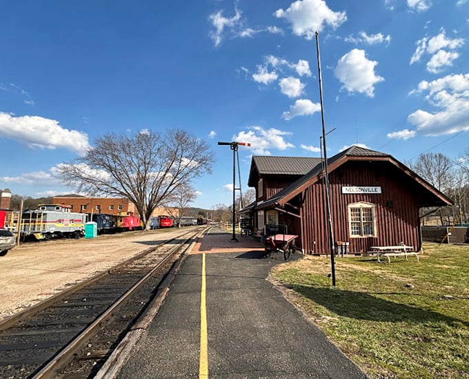 The Hocking Valley Scenic Railway station stands ready for its next departure, a portal to slower times when travel was as much about the journey as the destination.