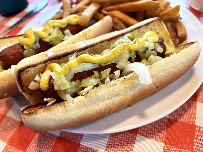 Hot dogs elevated beyond ballpark fare, dressed with enough toppings to make you forget you're essentially eating a sandwich built around mystery meat.