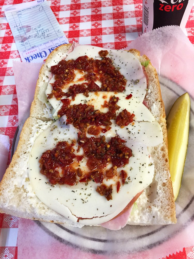 Hot peppers adding their fiery personality to sliced meats and cheese – proof that sometimes the best relationships have a little heat. 