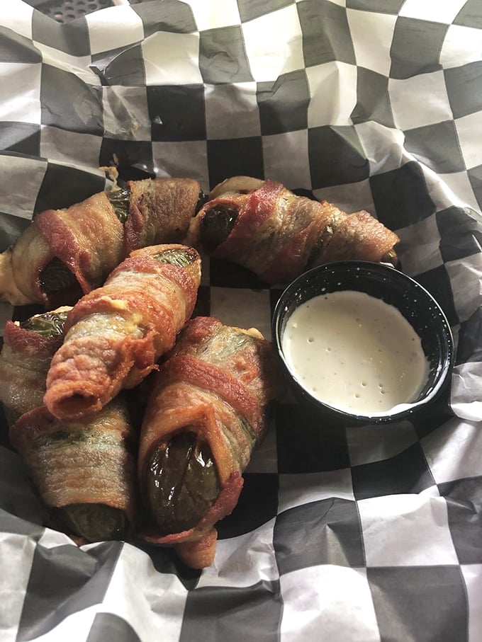 Jalapeño poppers wrapped in bacon—because sometimes vegetables need to dress up in party clothes to really show you what they're capable of.