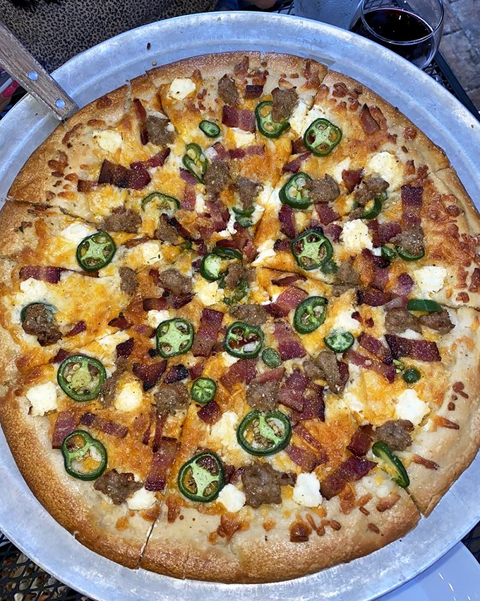 Jalapeños, bacon, and cheese—this pizza brings the heat and satisfaction of a Florida summer romance without the drama.