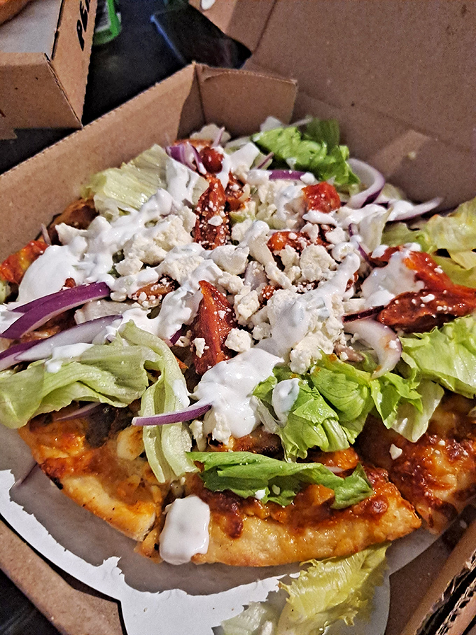 The "John Belushi" pizza combines meatballs and pepperoni in a combination that's both rebellious and comforting—just like its namesake.