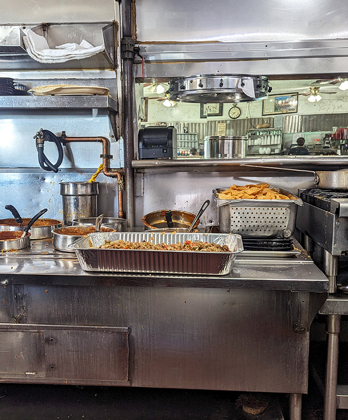 Behind the scenes magic happens here—where giant pots of beans simmer and tortilla chips await their moment of glory.