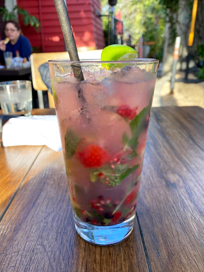A mojito that's hosting a berry convention. This drink has more fresh ingredients than most people's refrigerators.