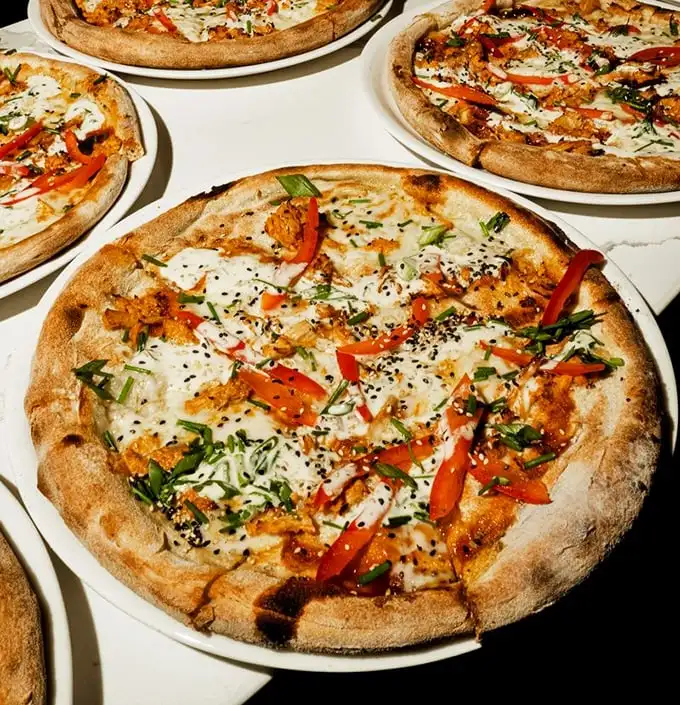 Pizza perfection in multiples—when one spectacular pie simply isn't enough. The hardest part is deciding which to try first.
