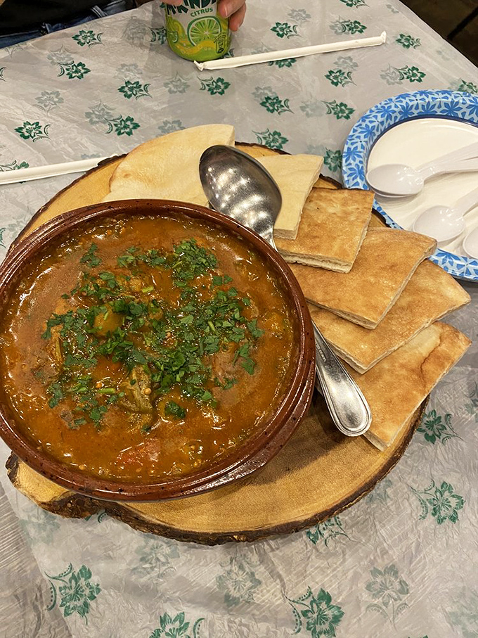This isn't just stew – it's a warm hug in a clay pot, with tender okra swimming in a rich, herb-flecked broth that demands to be sopped up with bread.